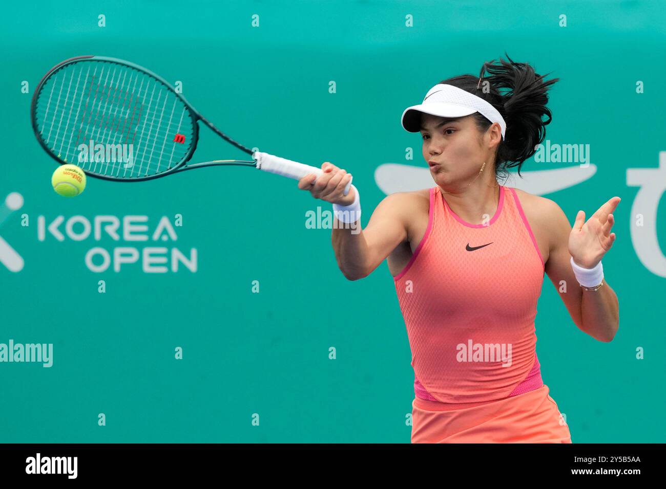Emma Raducanu of Britain returns a shot to Daria Kasatkina of Russia ...