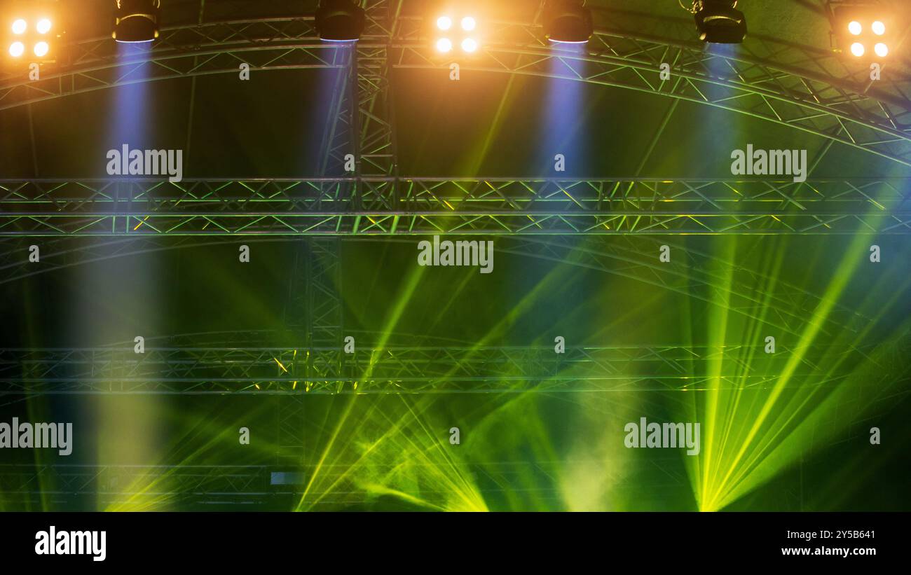 Spotlights and laser beams. Live concert stage illuminations Stock ...