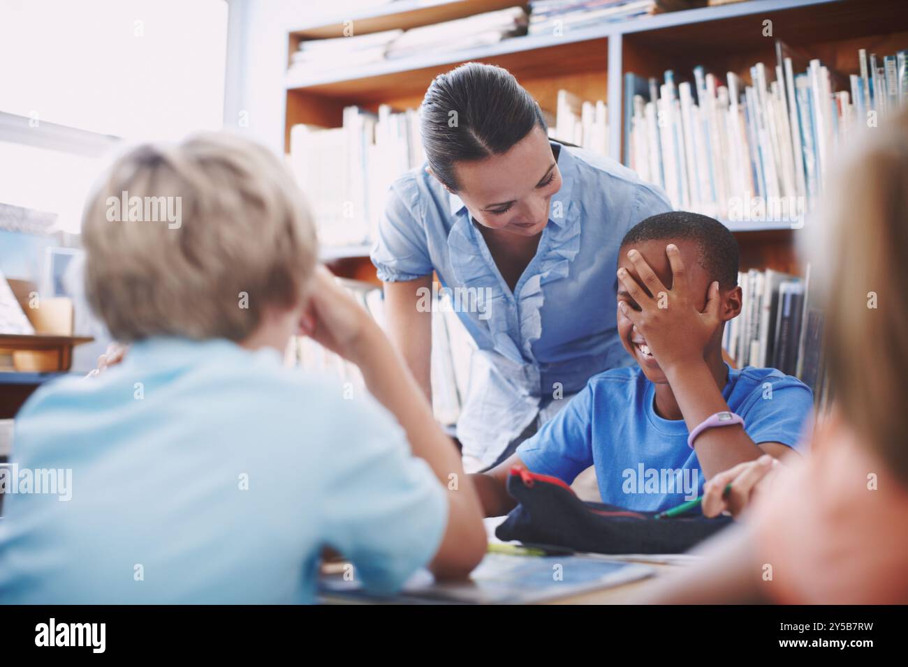 Children laughing teacher classroom hi-res stock photography and images ...