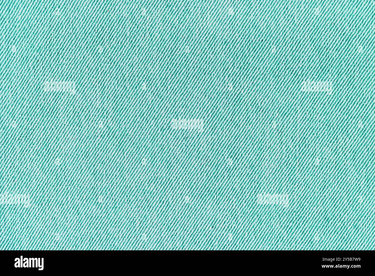 Closeup, macro of turquoise jeans denim fabric texture background ...