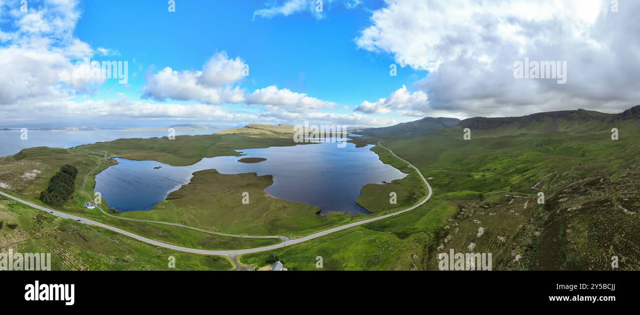 The North Coast 500 scenic route winding around a lake in the Scottish ...