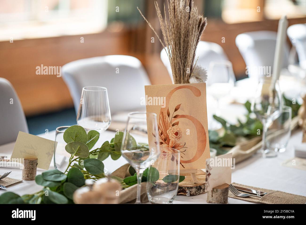 Wedding decor. Beautiful event venue. Indoor round reception table with ...