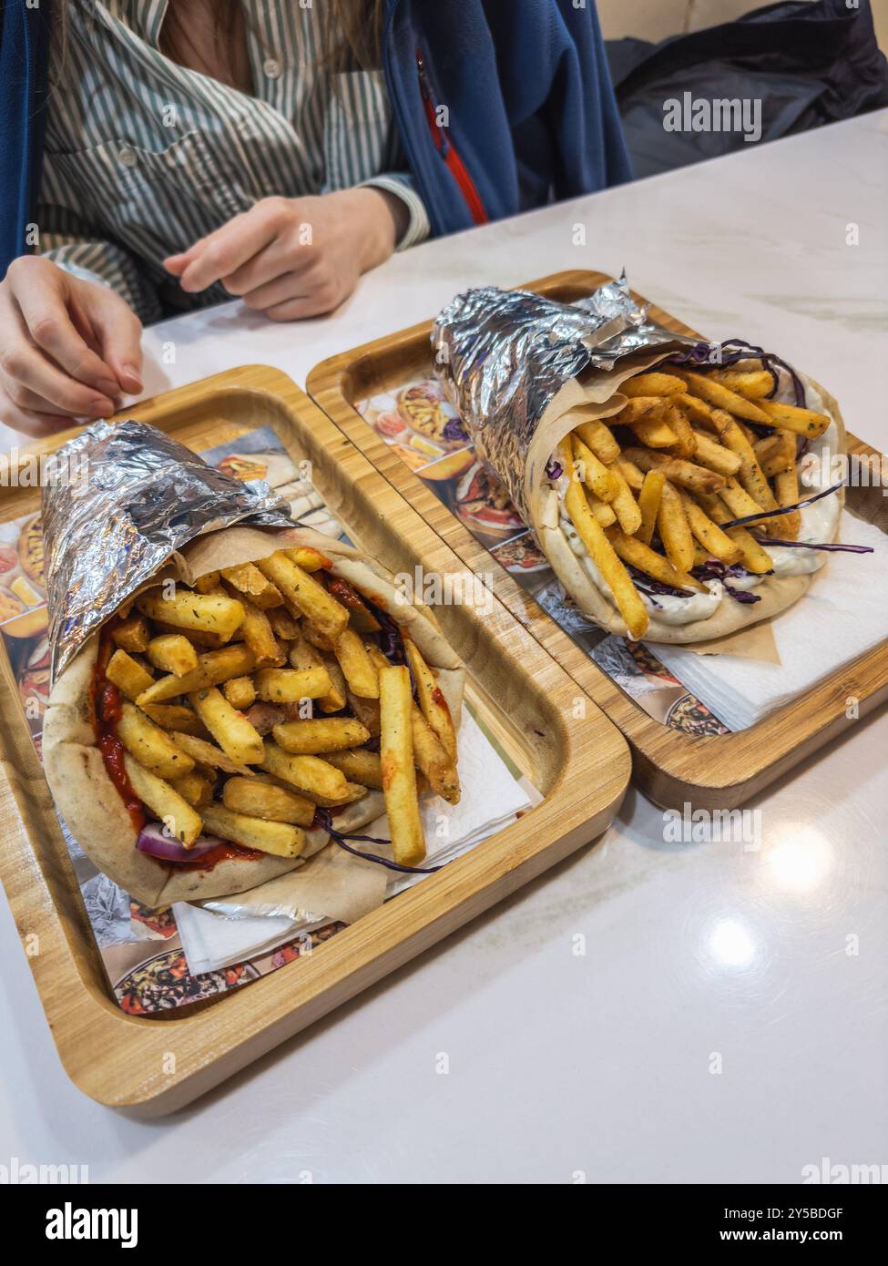 Delicious Wraps with Fries Stock Photo - Alamy