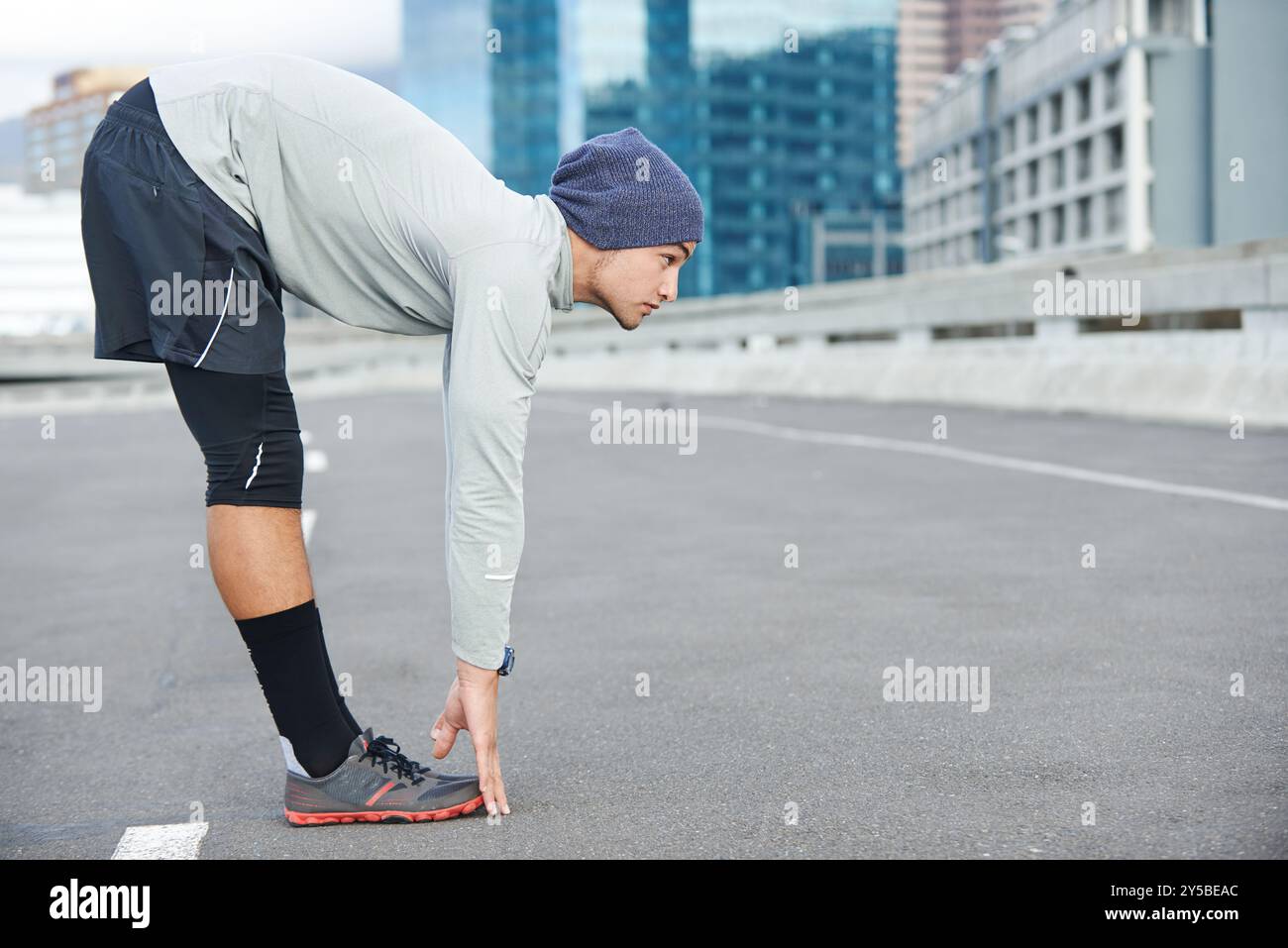 Man, runner and stretching legs in city with calf muscle, ready and ...