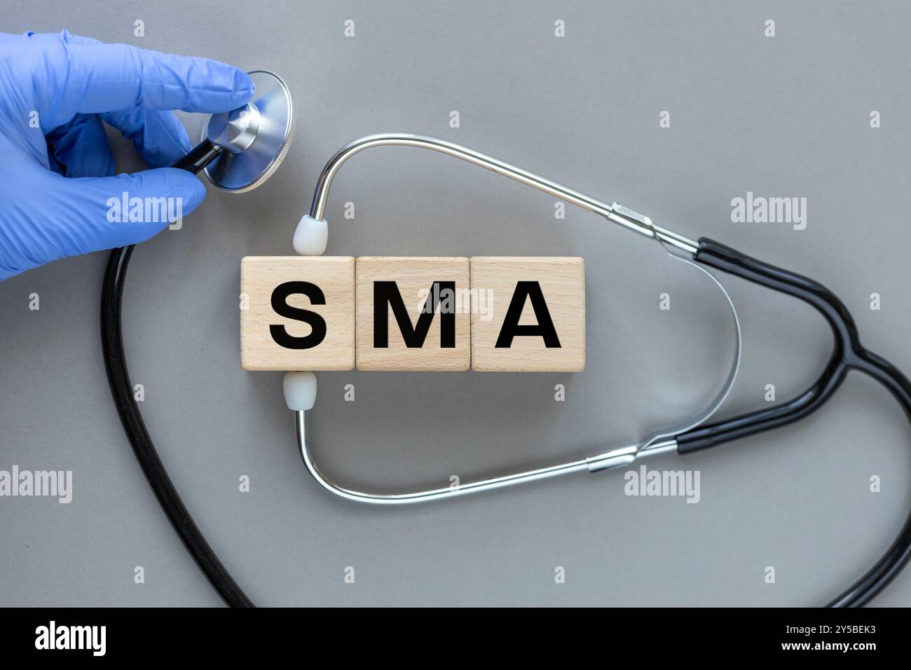 Spinal muscular atrophy SMA, Medical stethoscope in doctor's hand and ...