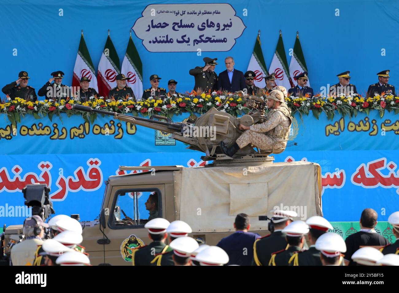 Tehran, Iran. 21st Sep, 2024. Iranian President MASOUD PEZESHKIAN (C ...