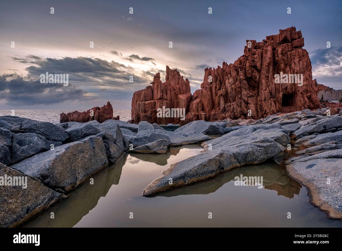 The so-called red rocks of Arbatax, rocce rosse, consisting of red porphyry and grey granite ...