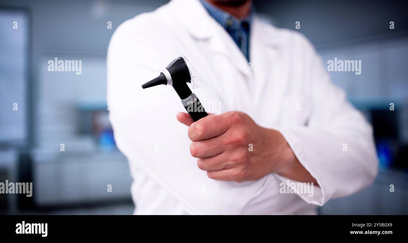 Audiology Hearing Care Medical Doctor With Otoscope Stock Photo - Alamy