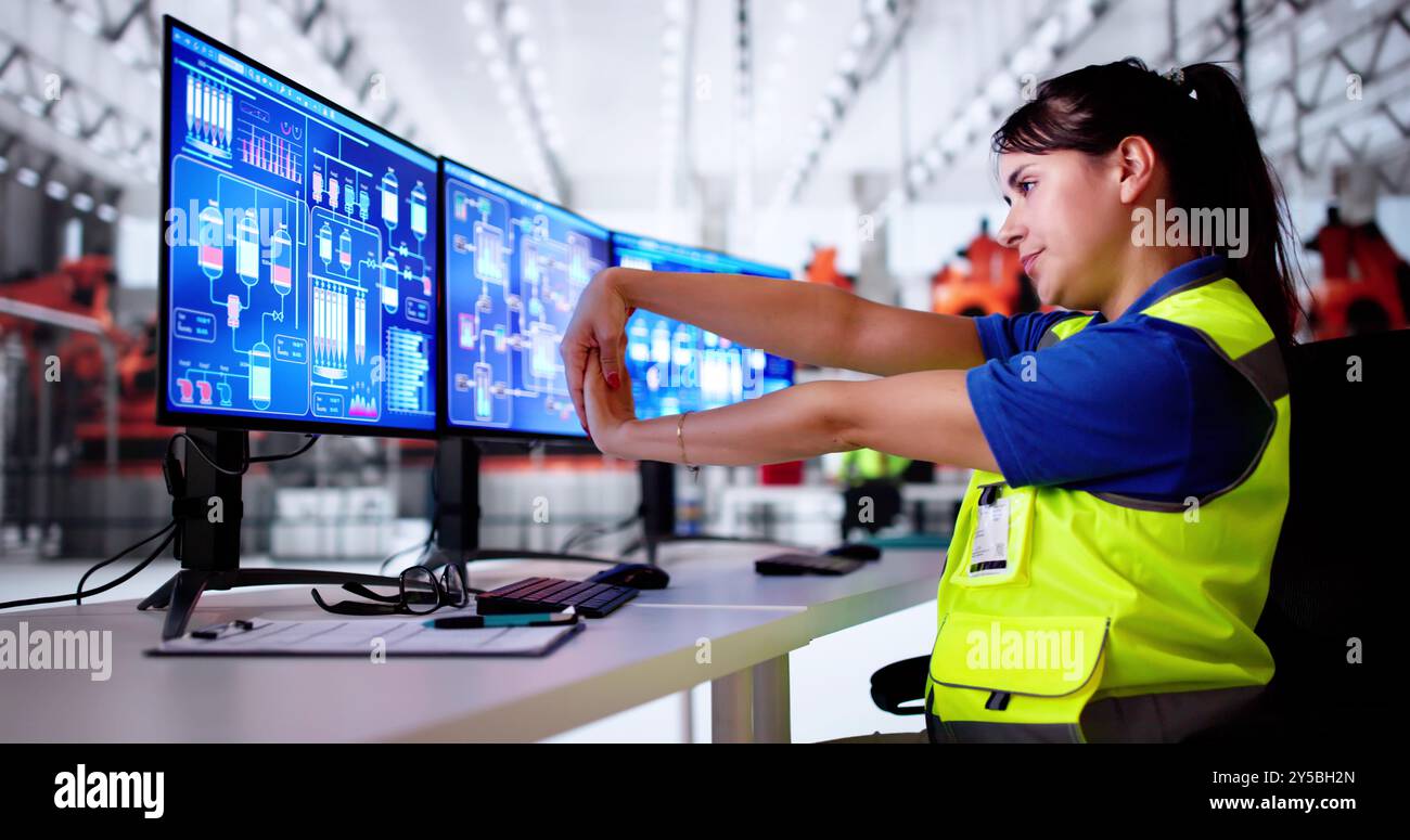 Stretch Arm Exercises While Working At Computer Stock Photo - Alamy