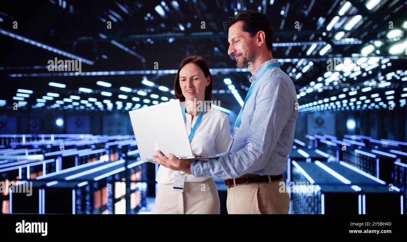 Server Room In Data Center. Cloud Computer Engineers Configuring AI Technology Stock Photo - Alamy