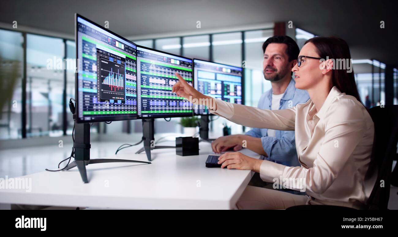 Analyst Employee Working On Spreadsheet Using Desktop Computer Stock ...