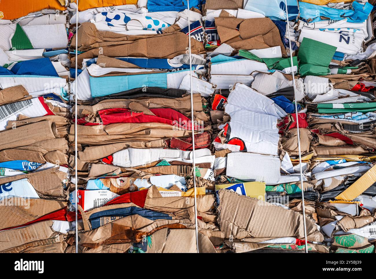 Cardboard compressed and ready to reuse Stock Photo - Alamy