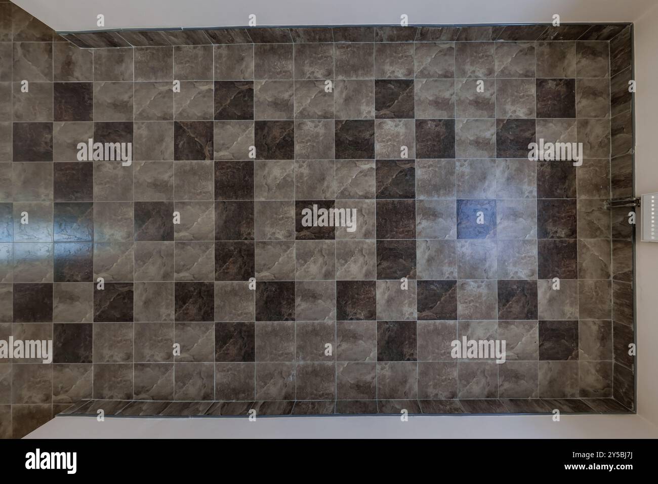 stone and ceramic floor tiles texture in corridor, view from above ...