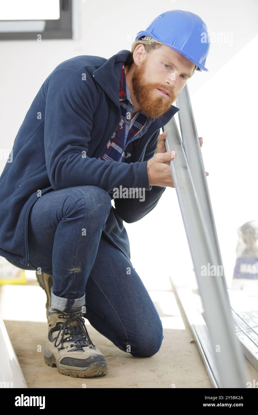 man working on concrete structure Stock Photo - Alamy