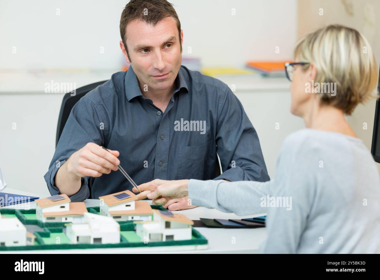 architect discussing important issues with the client Stock Photo - Alamy