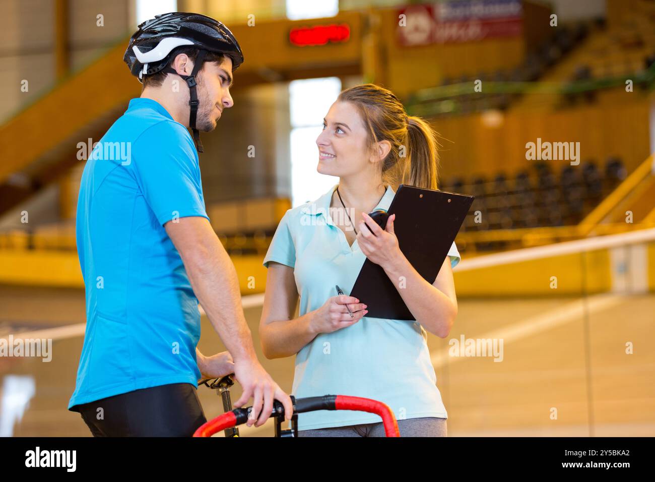 portrait of cyclist and coach talking Stock Photo - Alamy