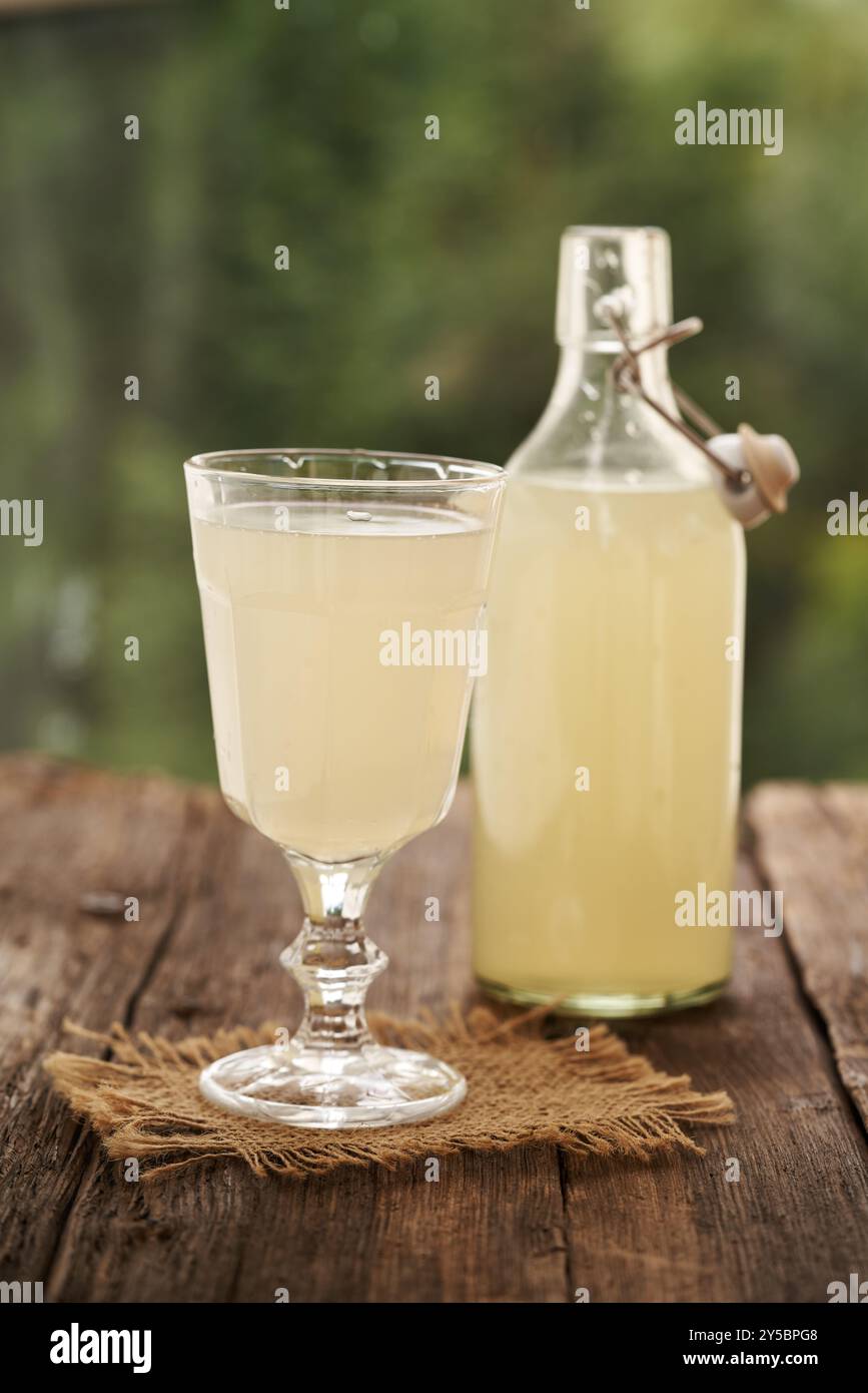 Fresh natural whey in a glass and bottle - protein rich healthy ...