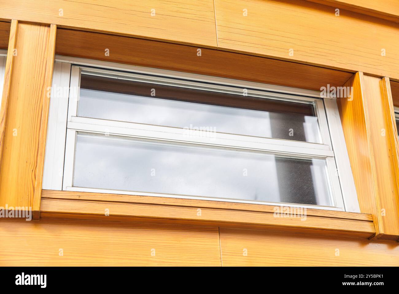 Wooden framed modern window, double glazed glass, on a contemporary ...