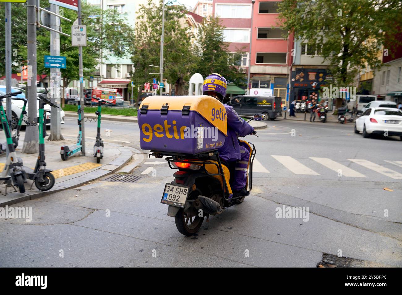 Istanbul, Turkey - 2 September 2024: A Getir delivery driver on a ...