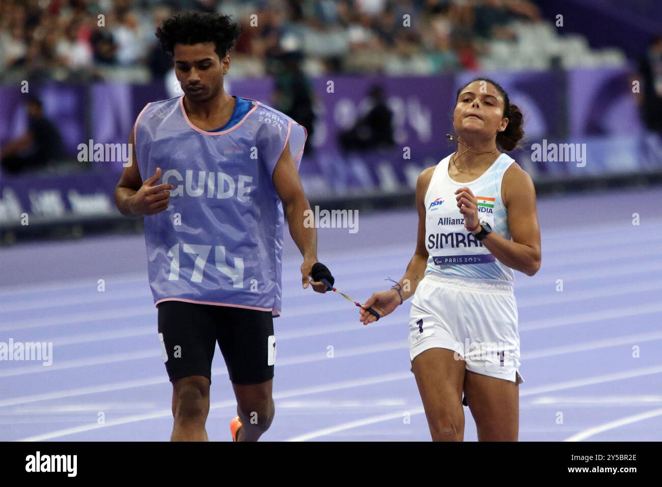 Simran Sharma & Guide Abhay SINGH of India in the Women's 100m - T12 ...