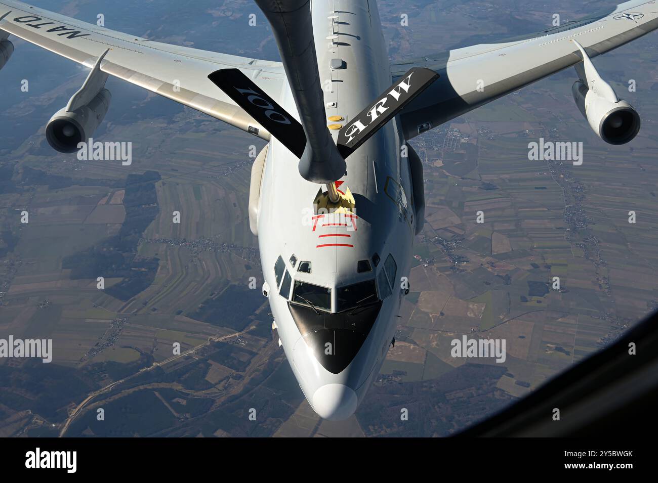 A NATO E3A Sentry Airborne Warning and Control System connects to the ...