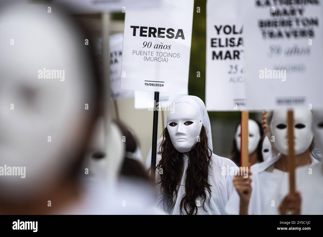 Madrid, Spain. 21st Sep, 2024. A group of women with masks, dressed in ...
