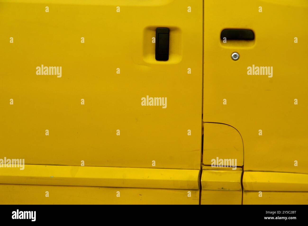 detailed of yellow car door Stock Photo - Alamy
