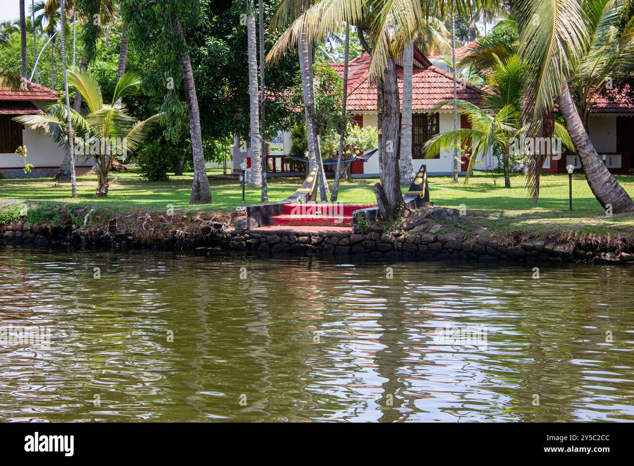 Landscaped gardens along the Alappuzha backwaters in the indian state ...