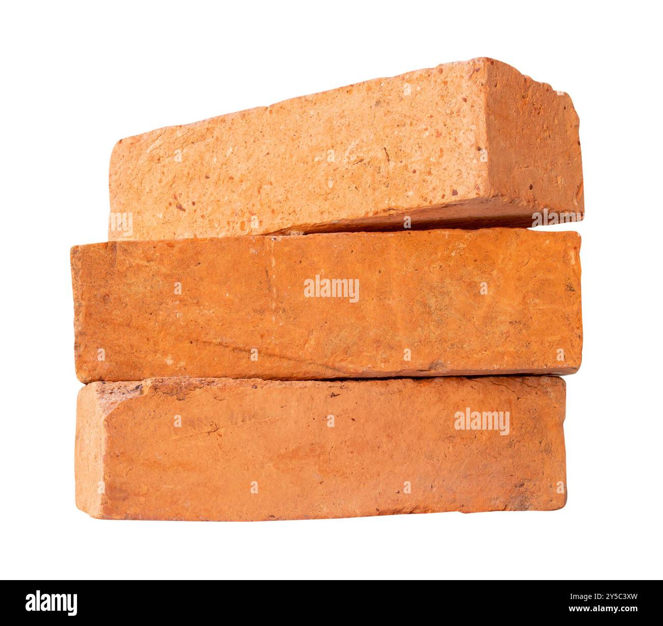 Side view of old red or orange bricks in stack is isolated on white ...
