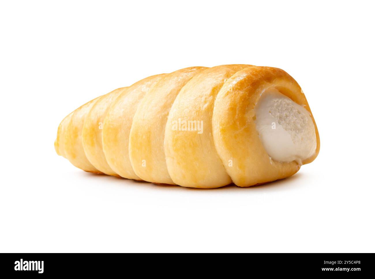 Side view of puff pastry cream horn is isolated on white background ...