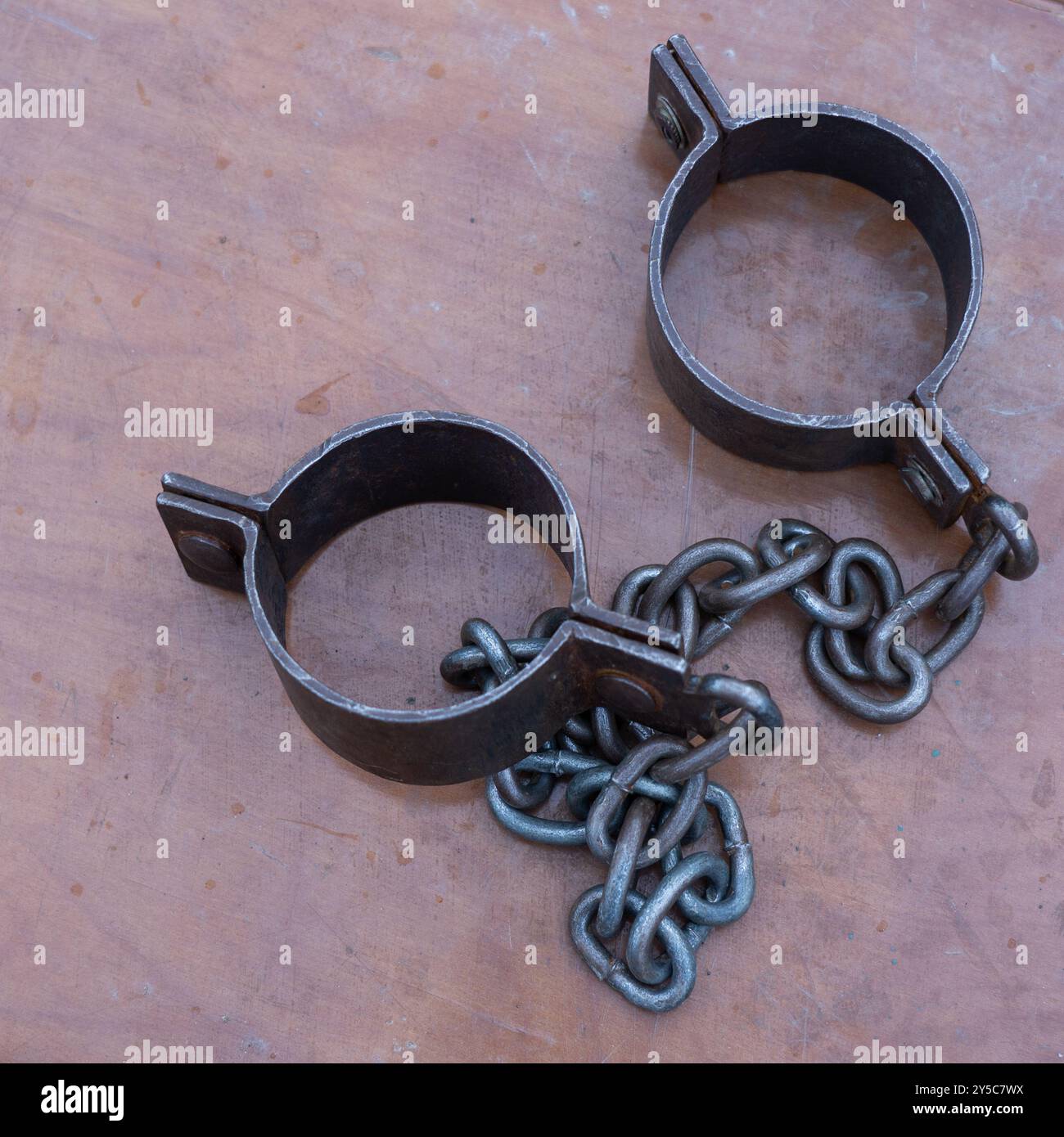 Ancient iron shackles of a slave with a chain Stock Photo - Alamy