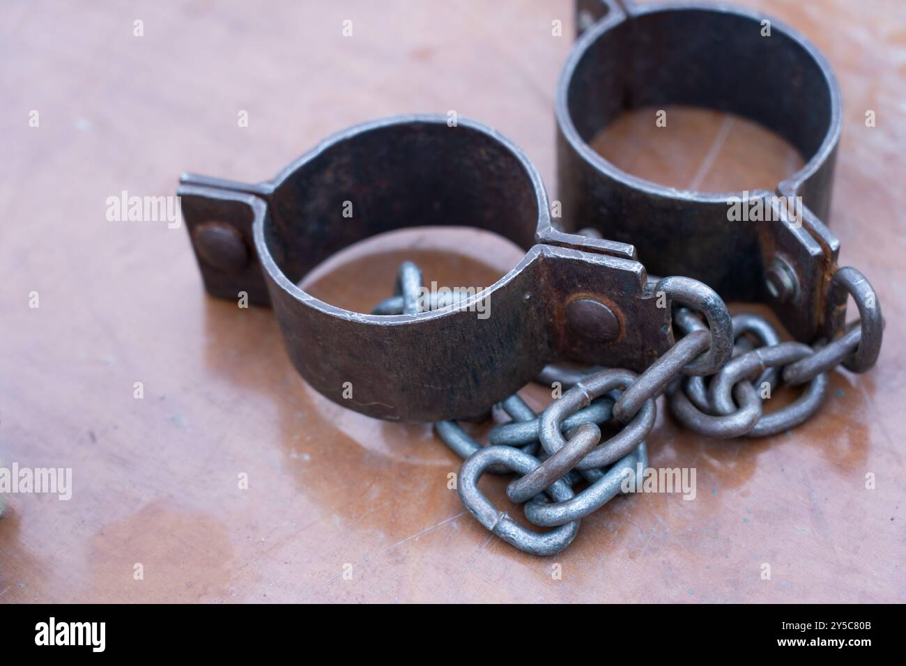 Ancient iron shackles of a slave with a chain Stock Photo - Alamy
