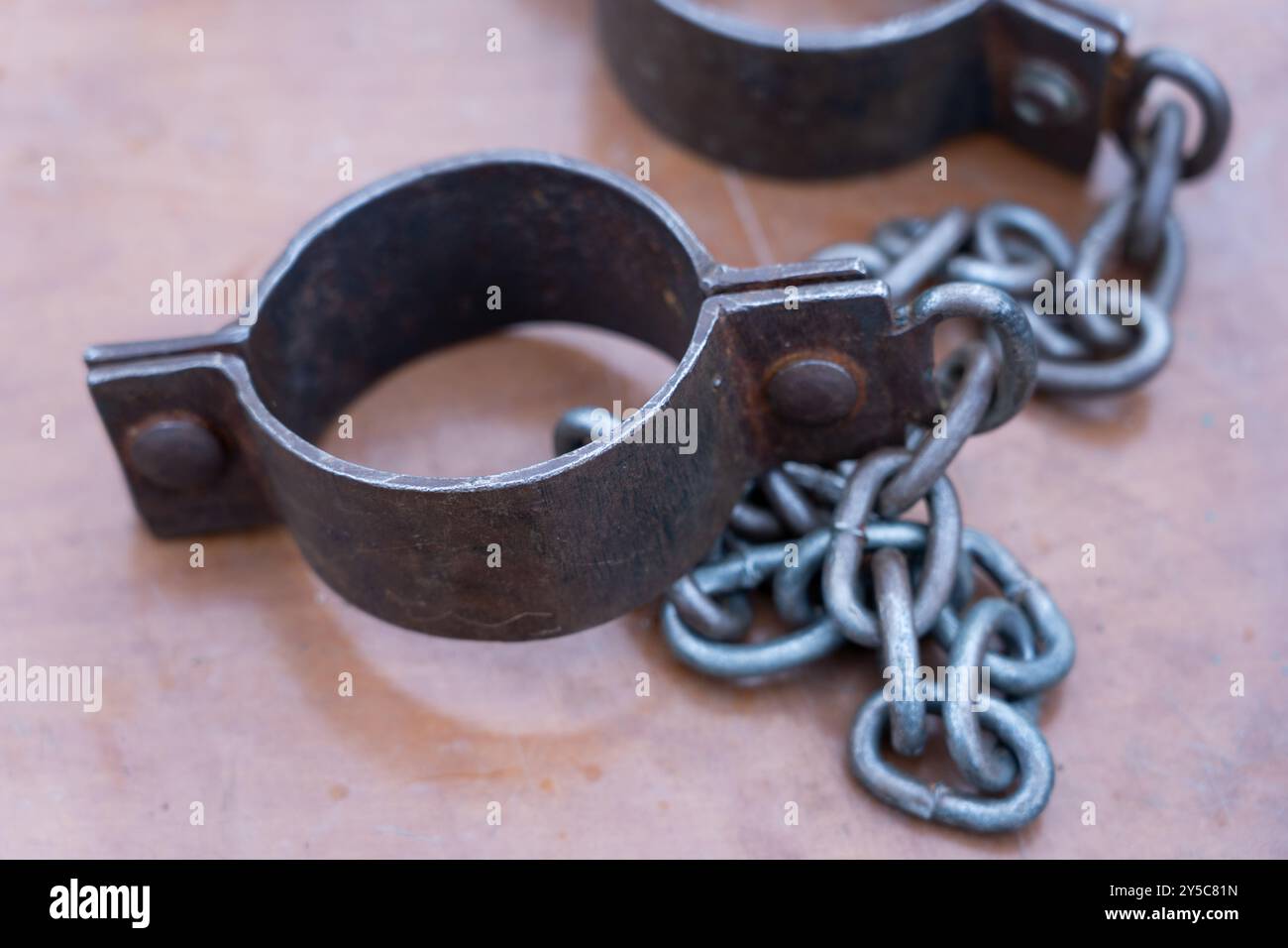 Ancient iron shackles of a slave with a chain Stock Photo - Alamy