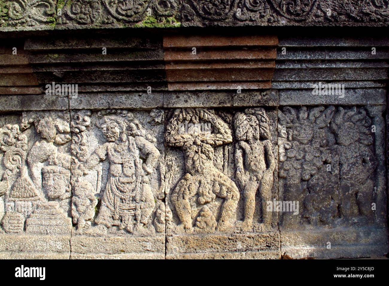 relief or carving on the stone wall at Penataran temple Stock Photo - Alamy