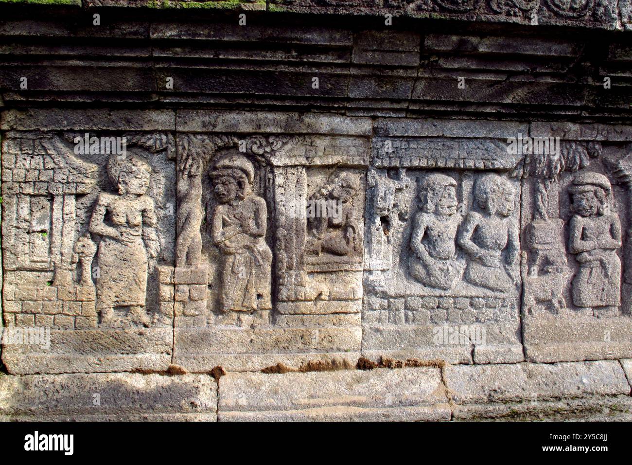 relief or carving on the stone wall at Penataran temple Stock Photo - Alamy