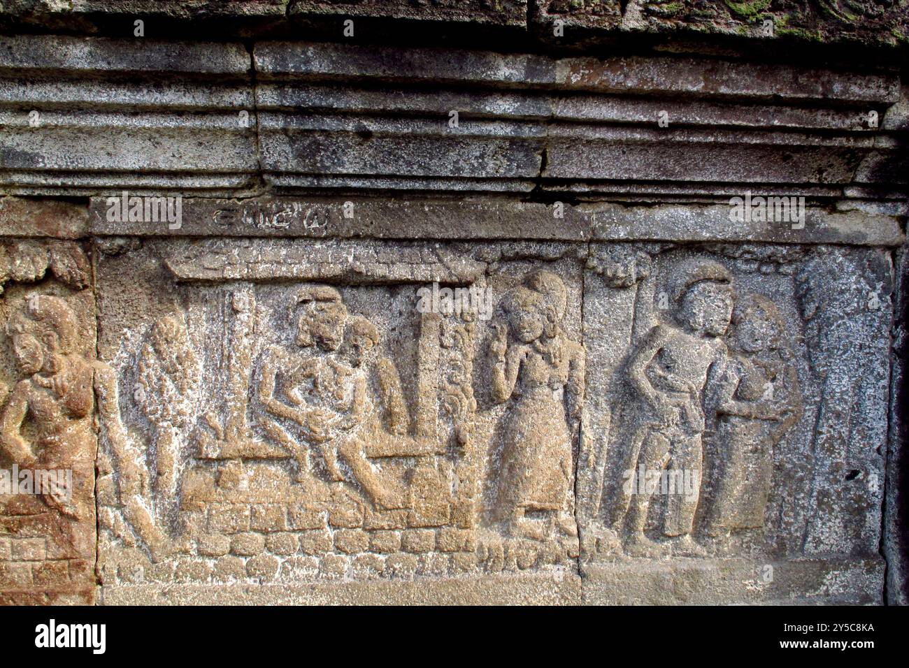 relief or carving on the stone wall at Penataran temple Stock Photo - Alamy