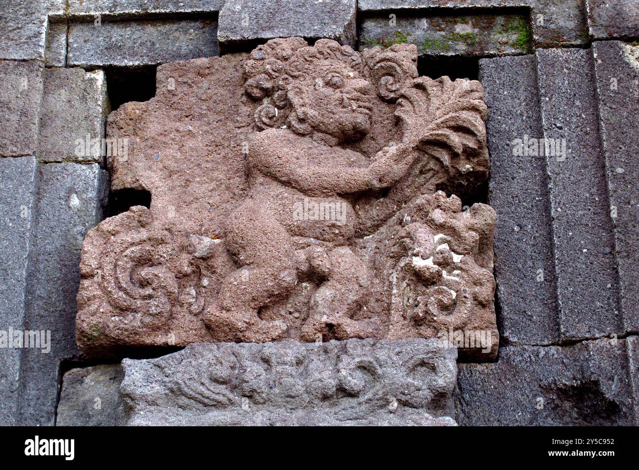 relief or carving on the stone wall at Penataran temple Stock Photo - Alamy