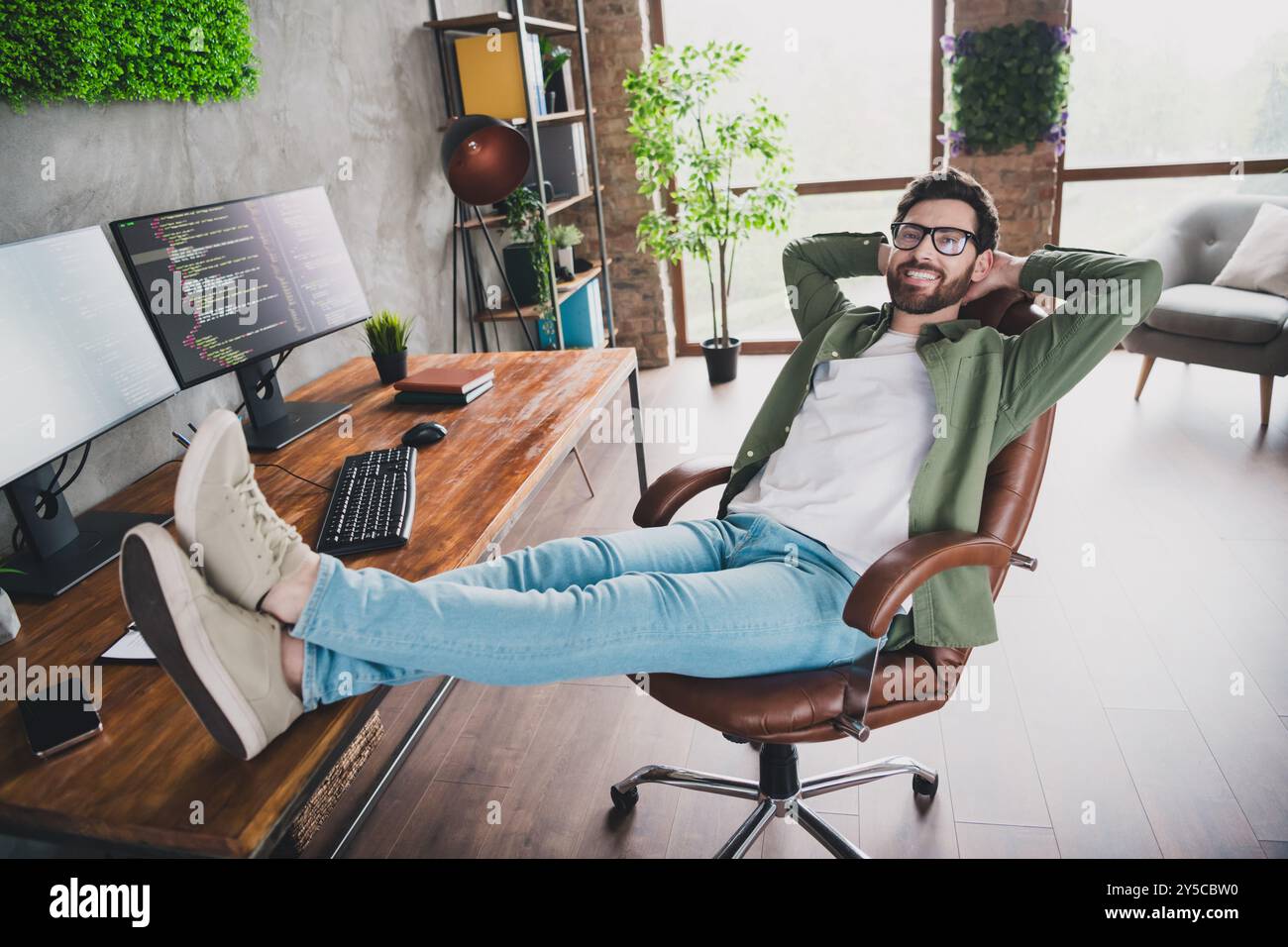Full body portrait of professional hacker young man sit chair legs ...