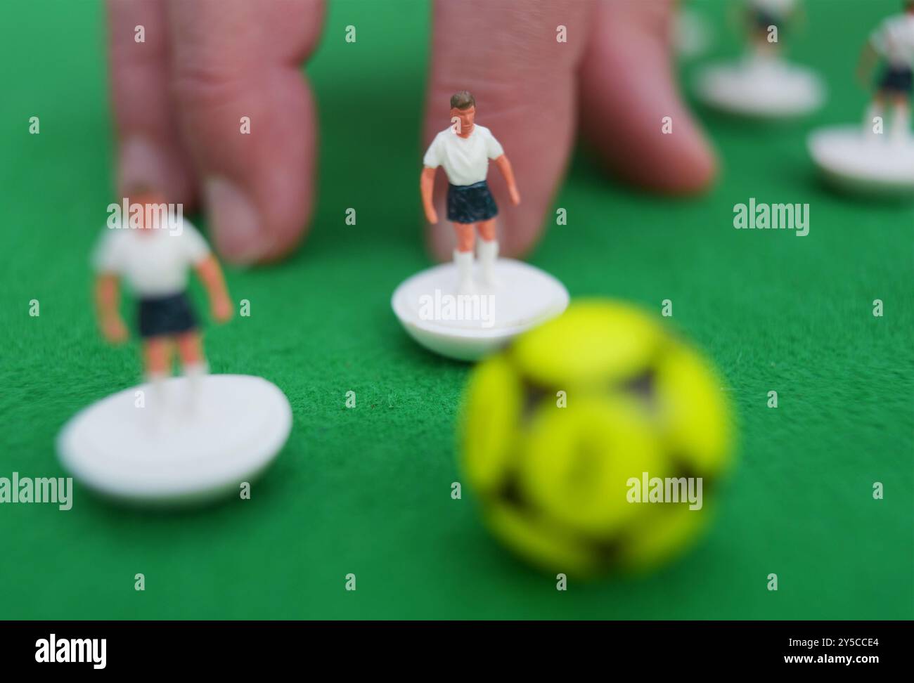 Subbuteo figures painted with vintage England shirts taking part in the ...