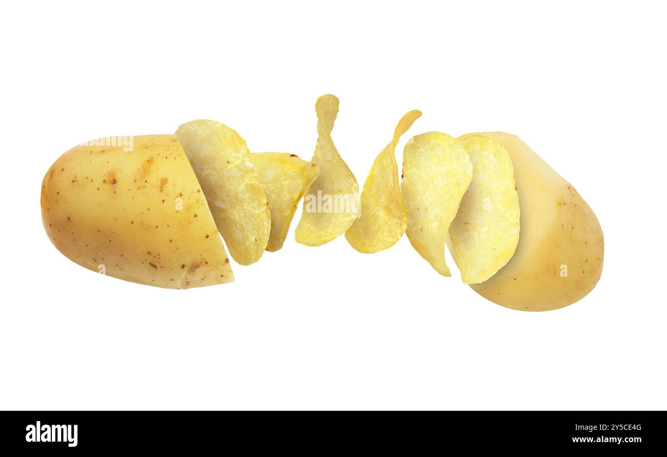 Raw potato turning into tasty crispy chips in air on white background ...