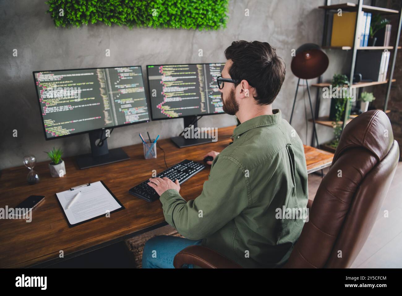 Photo of professional it specialist young man write keyboard computer ...