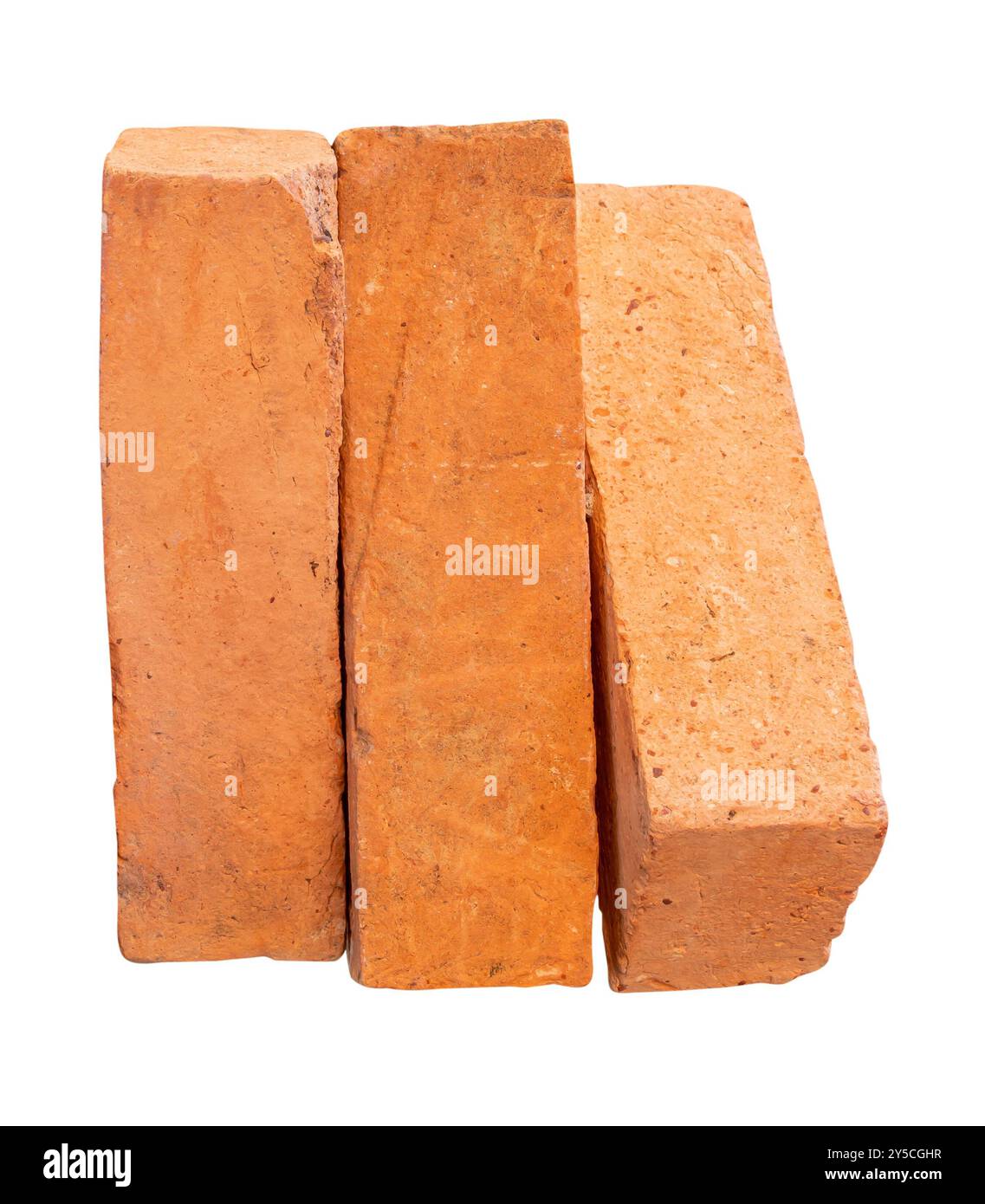 Side view of old red or orange bricks in stack is isolated on white ...