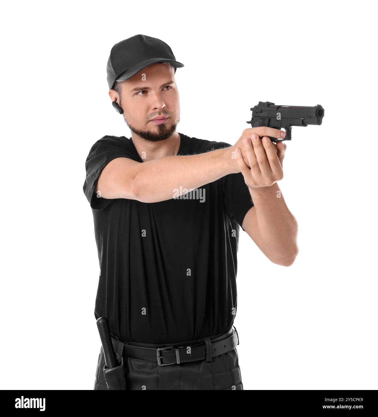 Young bodyguard using gun on white background Stock Photo - Alamy