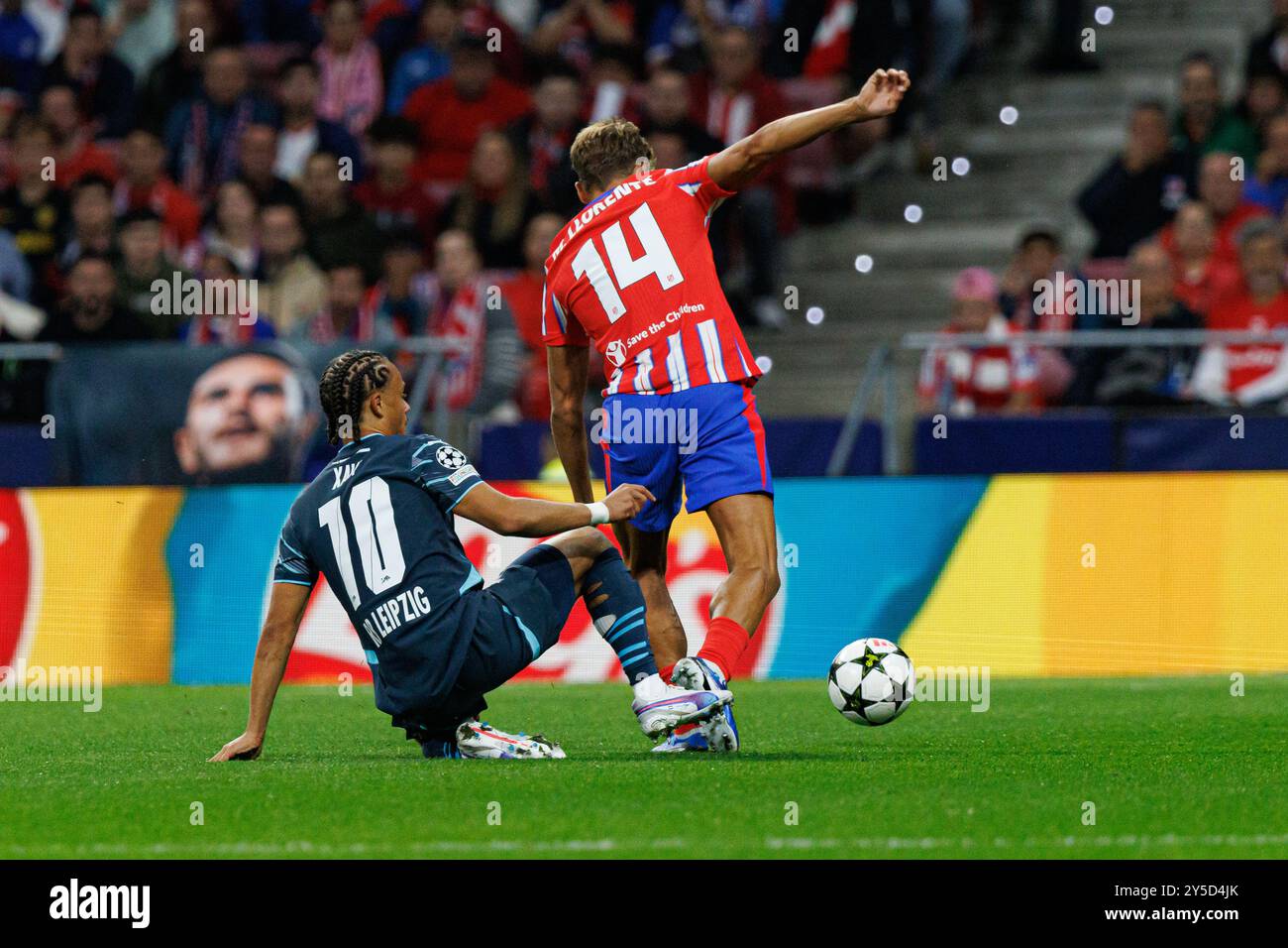 Xavi Simons, Marcos Llorente seen during UEFA Champions League game ...