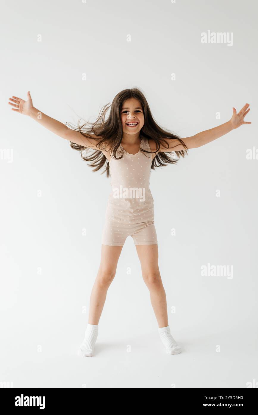 Full length cute little girl in pajama Stock Photo - Alamy