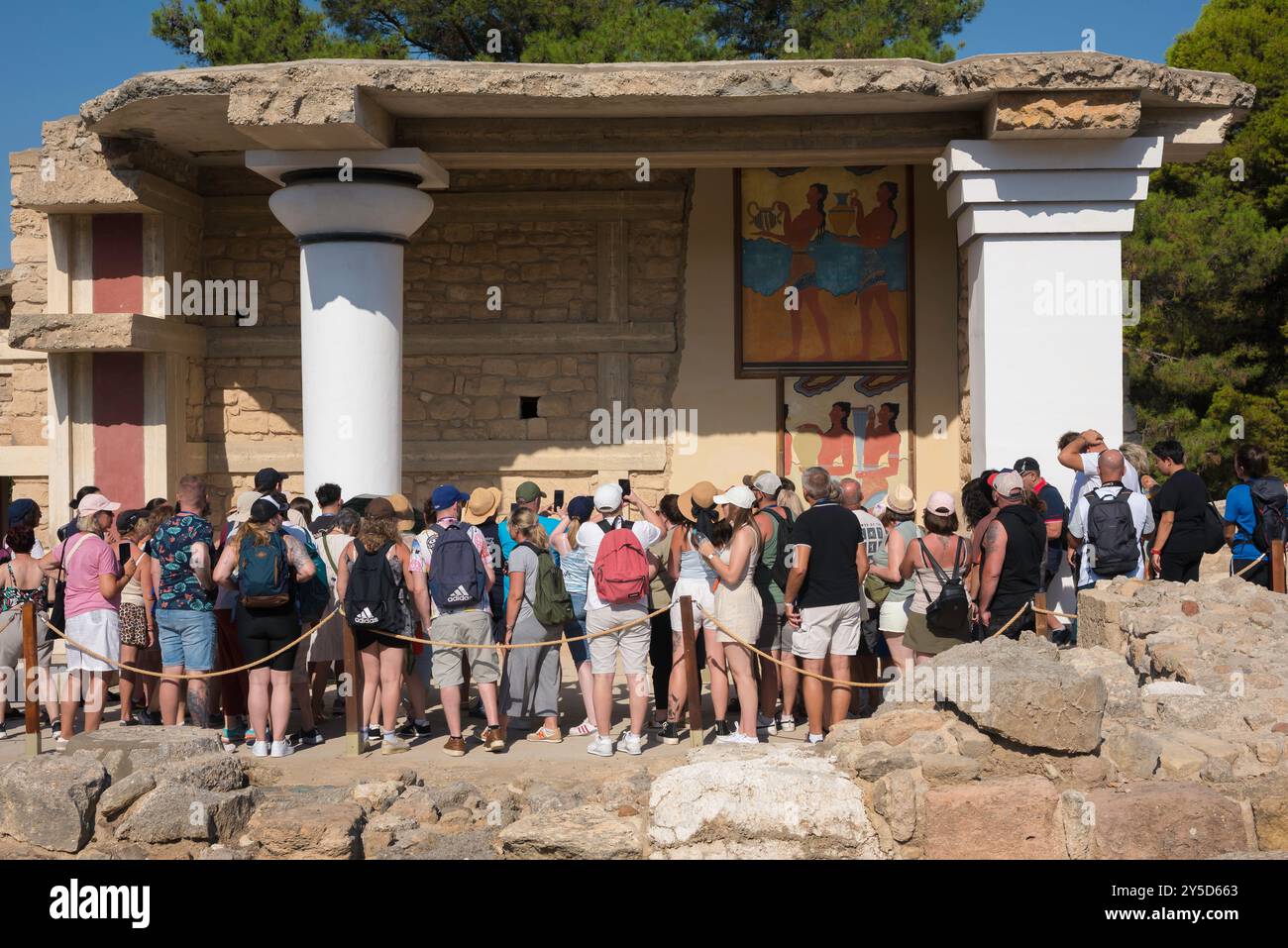 Tourism crowd, rear view of tourists crowding a section of the ancient ...