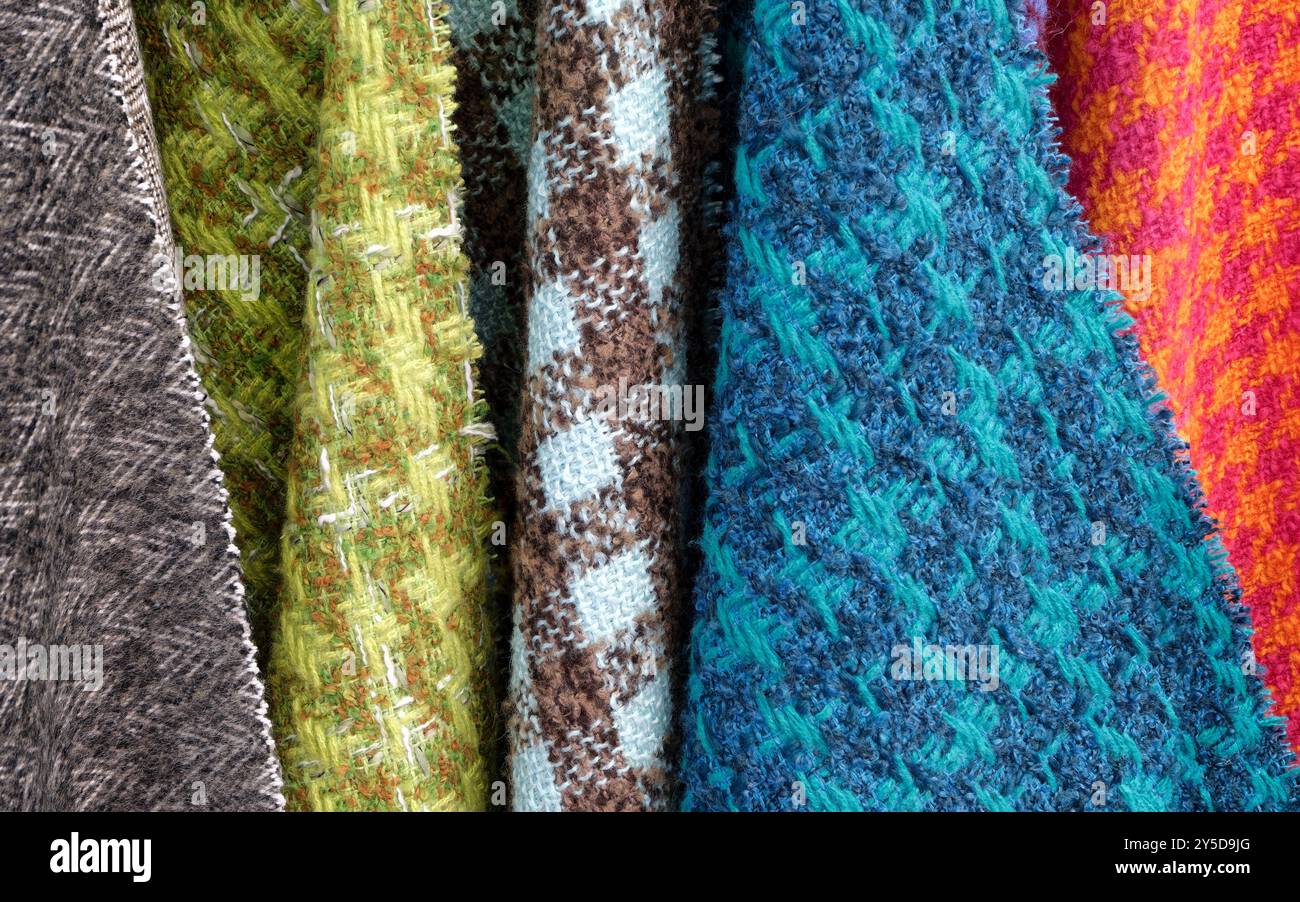 Samples of multi-coloured fabrics, abstract textile industry background ...