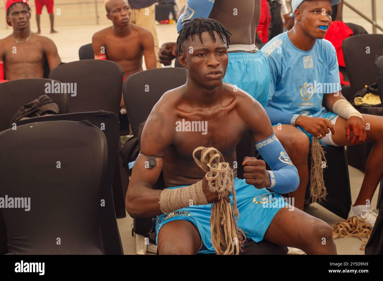 People watch Dambe boxers fight during the Dambe Warriors Supper fight ...