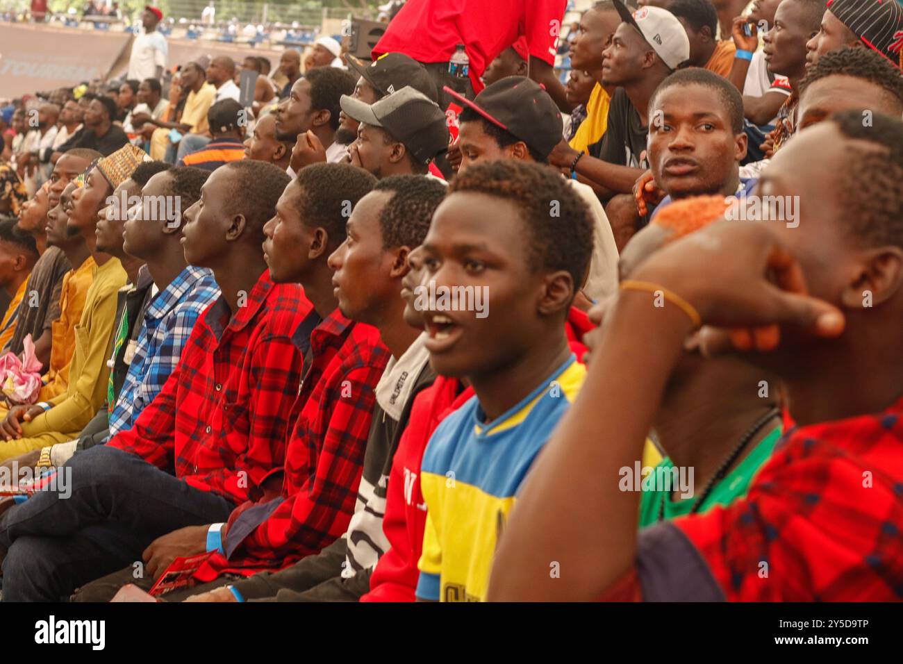 People watch Dambe boxers fight during the Dambe Warriors Supper fight ...