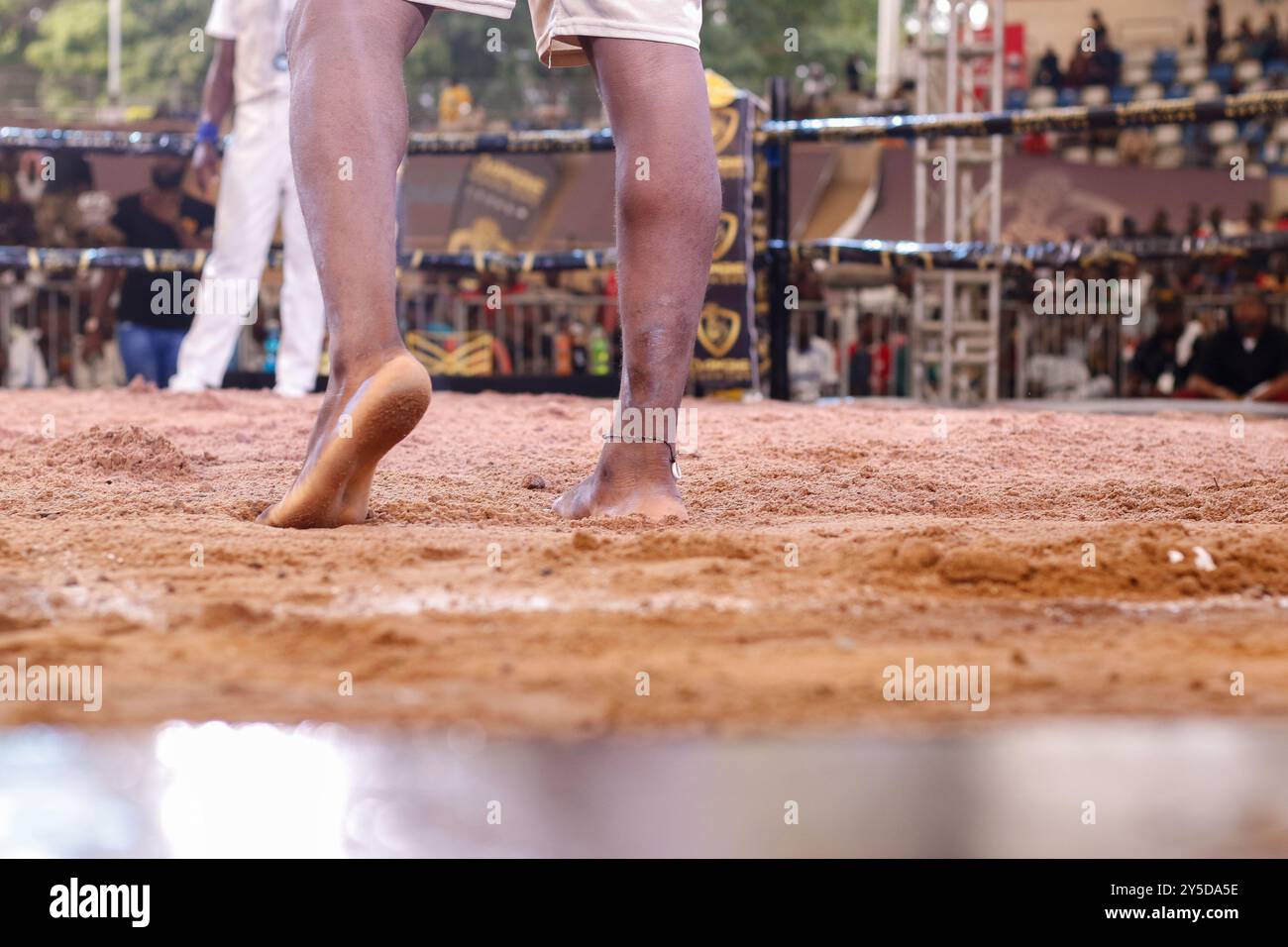 People watch Dambe boxers fight during the Dambe Warriors Supper fight ...